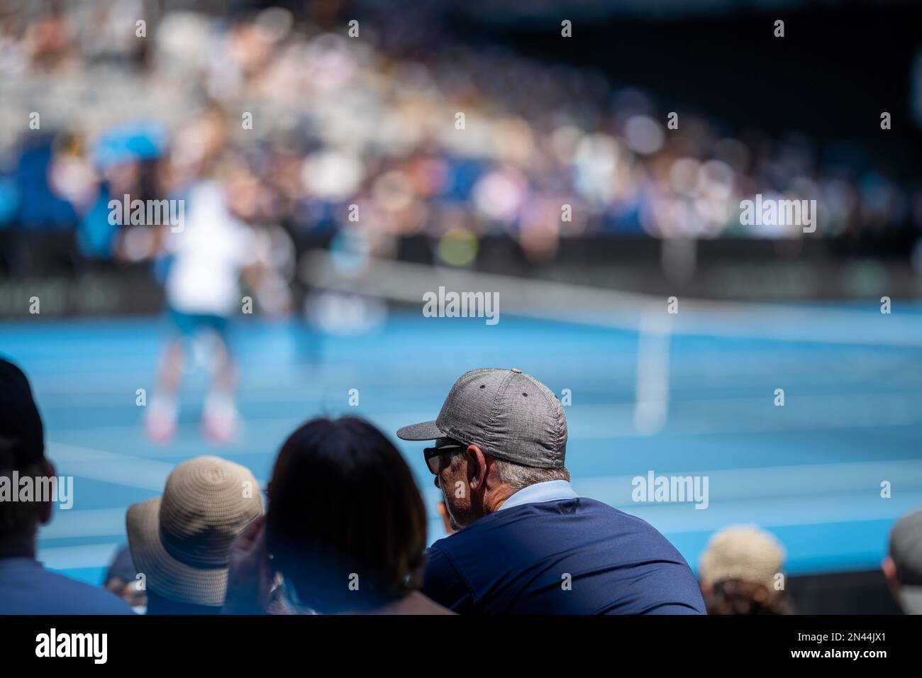 female Professional athlete Tennis player playing on a court in a ...