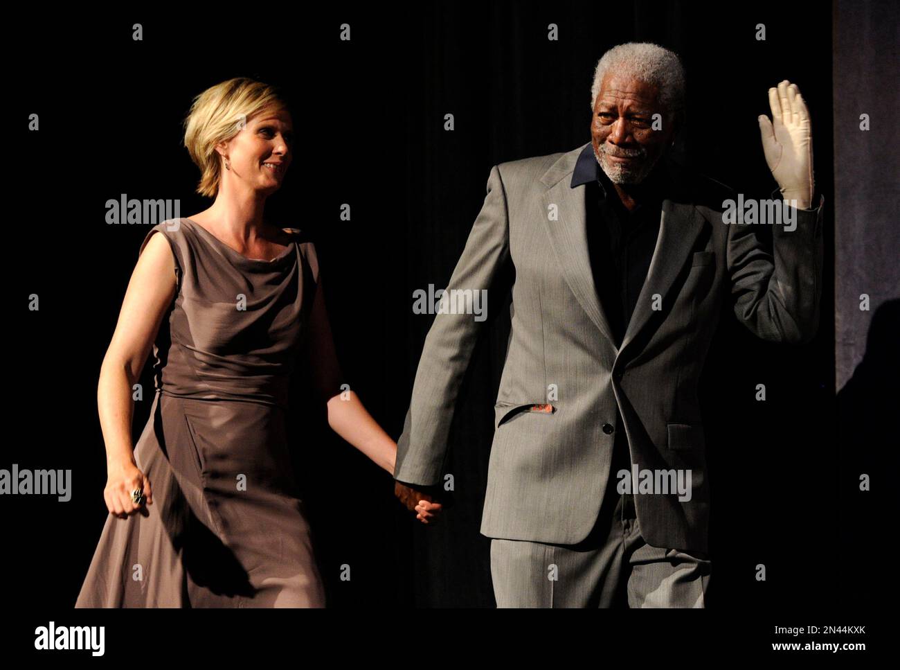 Cynthia Nixon, left, and Morgan Freeman walk on stage at the premiere ...