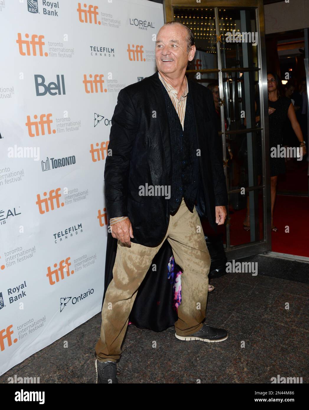 A drenched Bill Murray arrives at the "St. Vincent" premiere during the ...