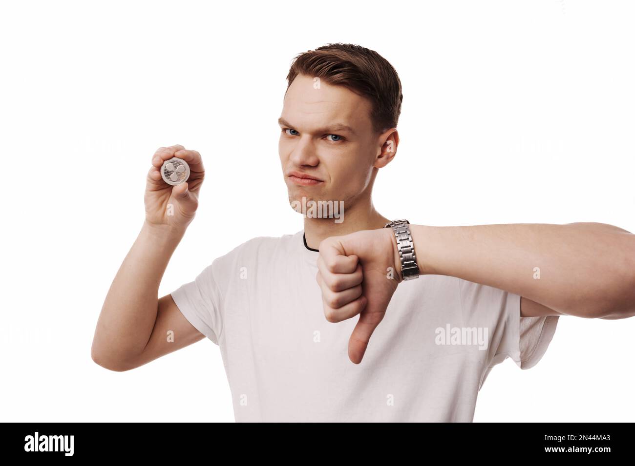The man shows dislike to Ripple. A dangerous asset Stock Photo - Alamy
