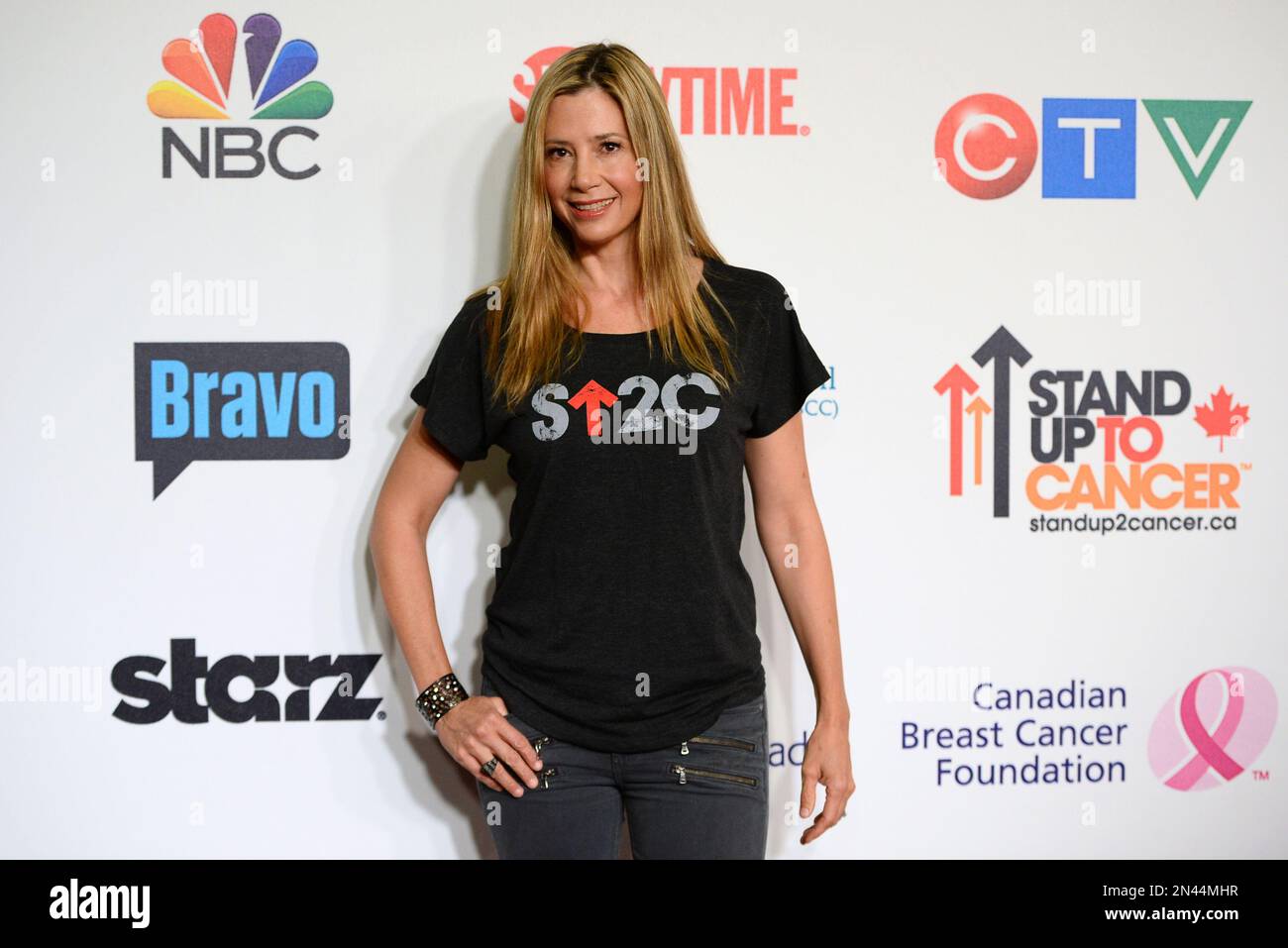 Mira Sorvino arrives at the 4th Annual Stand Up 2 Cancer Live Benefit ...