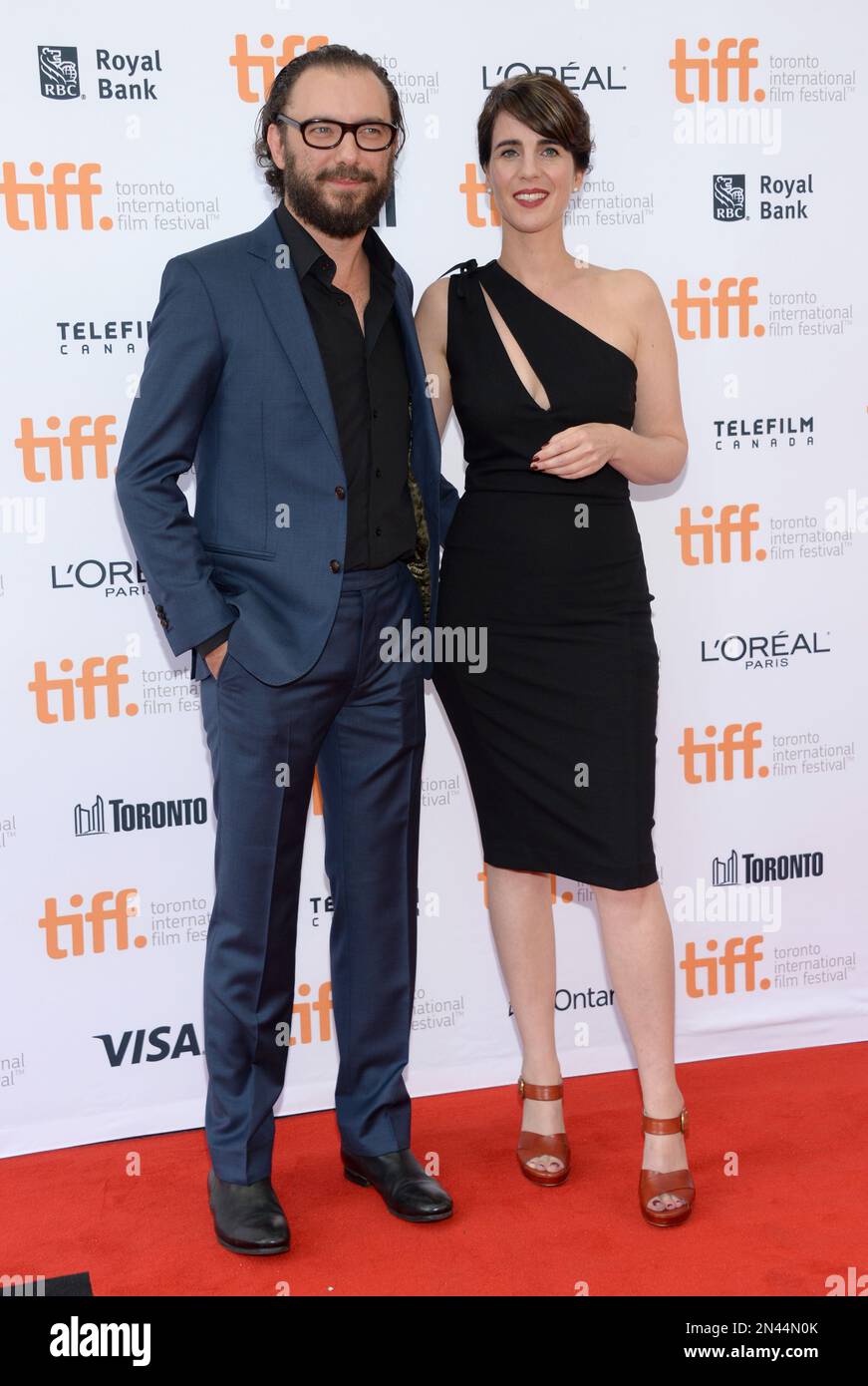 Director Michael R. Roskam, left, and Anneleen Masschelein arrive at ...