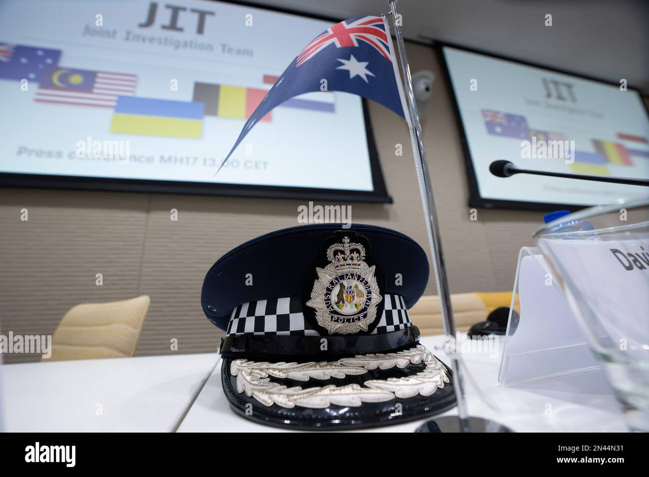 The peaked cap of David McLean, Australia's Federal Police, sits on the ...