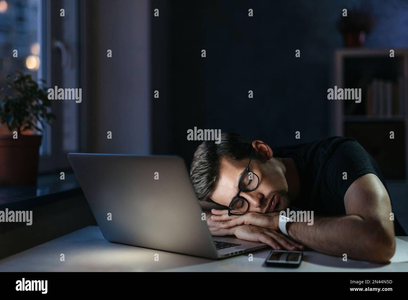 Young overworked distressed businessman freelancer fell asleep at ...