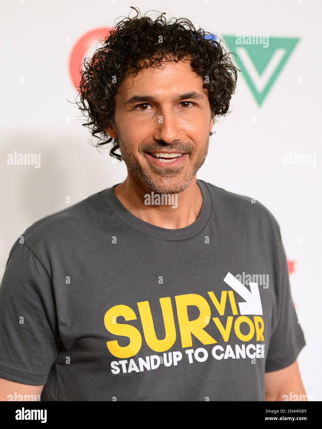 Ethan Zohn arrives at the 4th Annual Stand Up 2 Cancer Live Benefit at ...