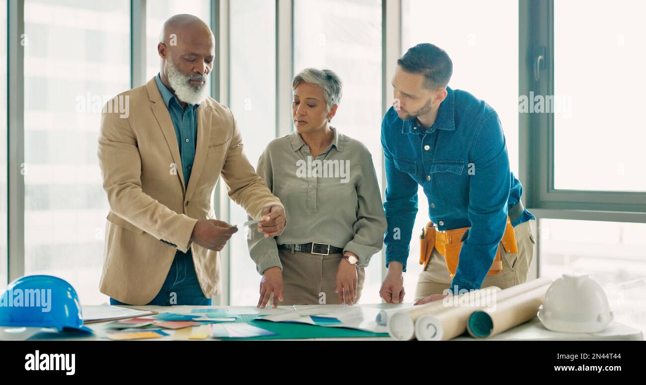 Architecture teamwork, blueprint and color choice in modern office for ...