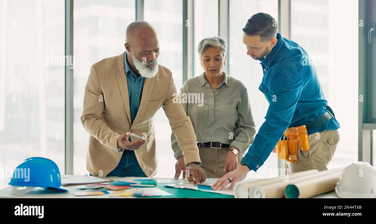 Architecture teamwork, blueprint and color choice in modern office for ...