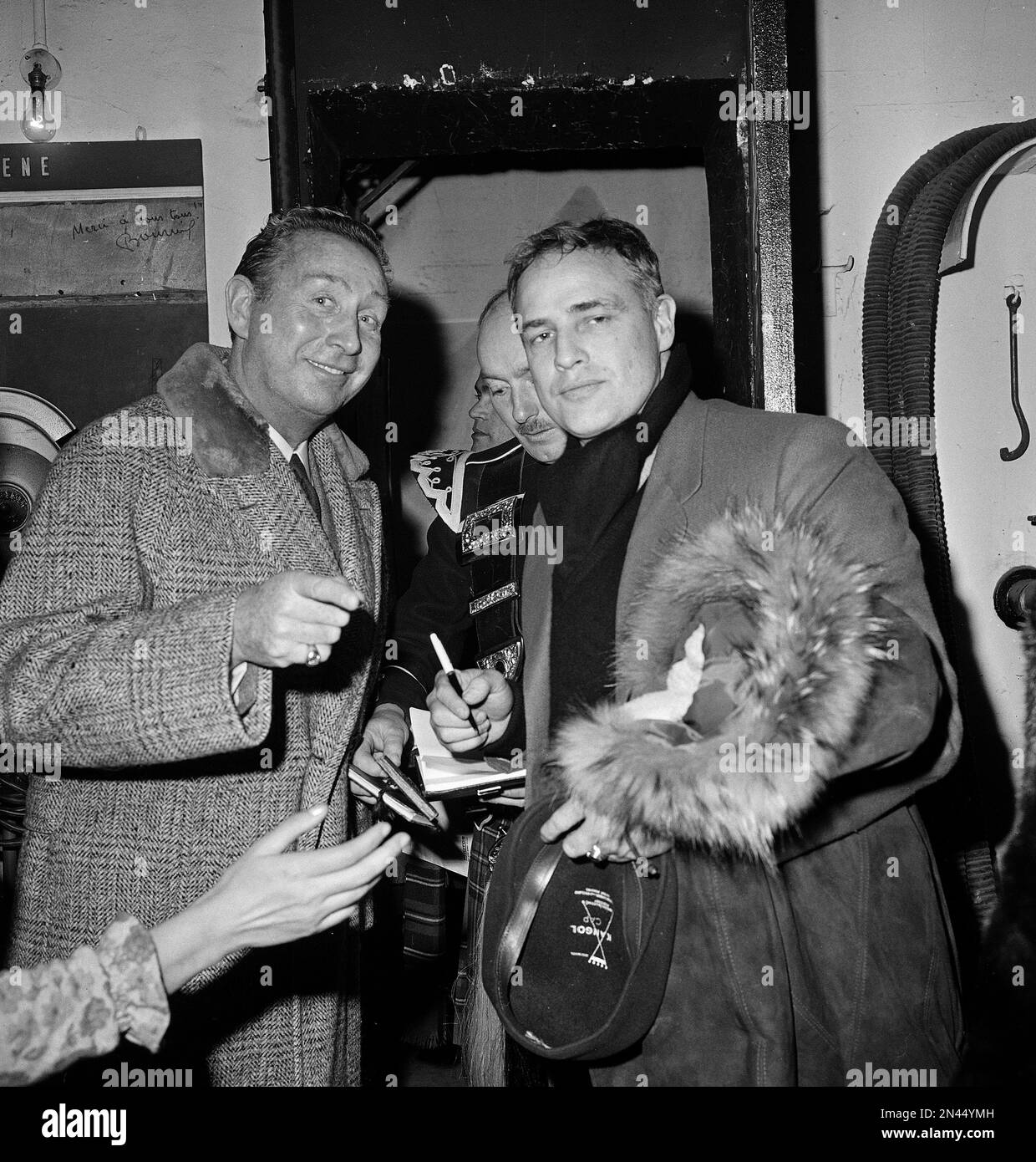 American actor Marlon Brando, right, meets French singer Charles Trenet ...