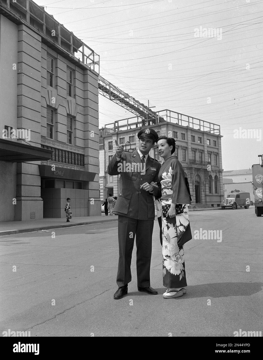 Actor Marlon Brando shows Japanese actress, Miiko Taka, one of the ...
