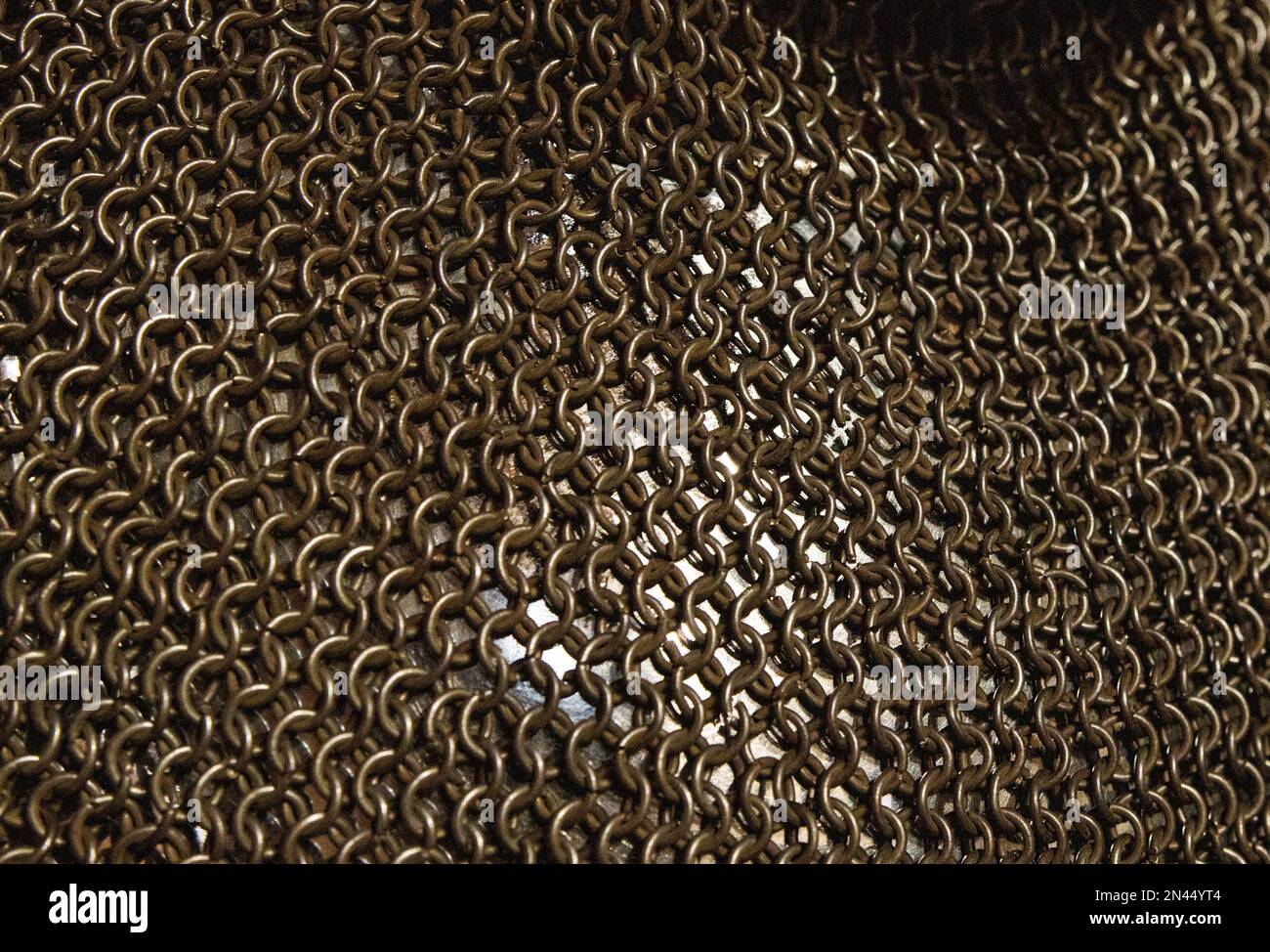 Protective old military chain mail, close-up. Mail made of round metal ...