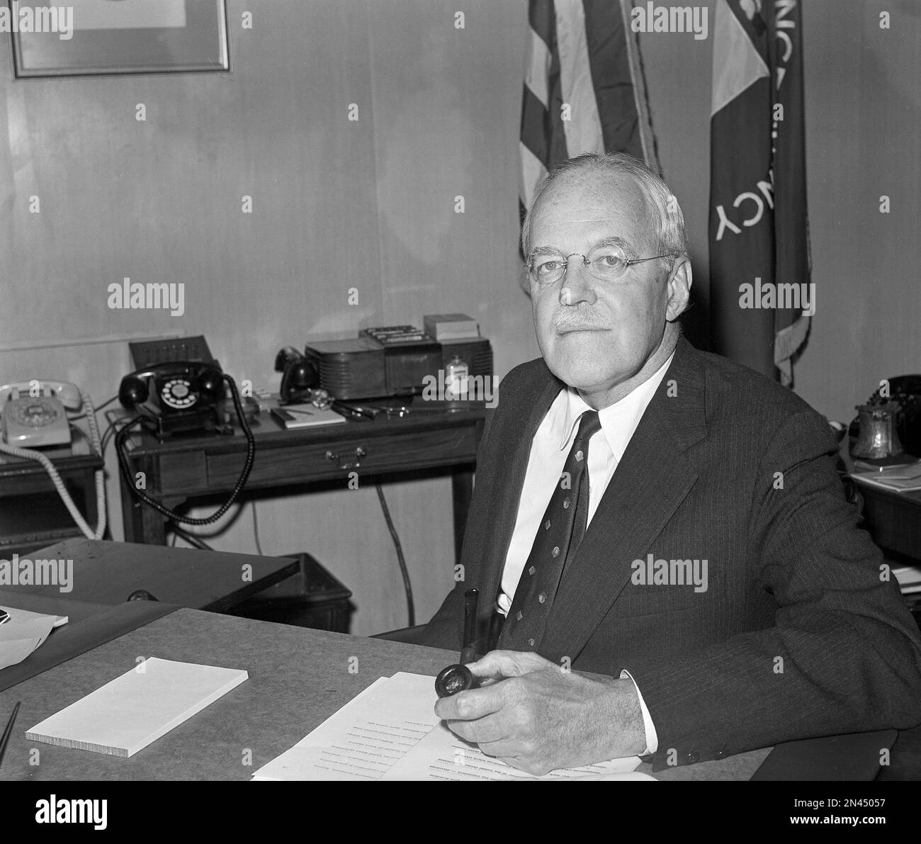 Allen W. Dulles, director of the Central Intelligence Agency, poses in ...