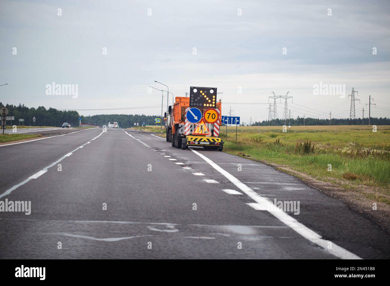 Special road equipment on the highway during road repair. Flashing road ...