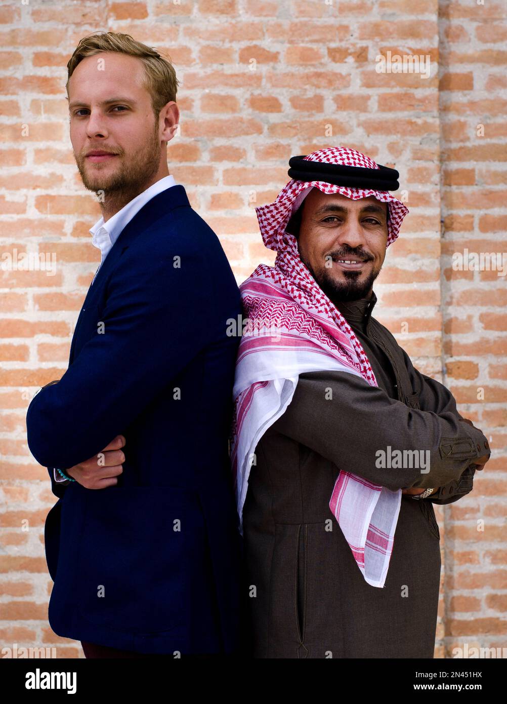 Actor, Jack Fox, left, poses with Bedouin actor Hassan Mutlag for ...