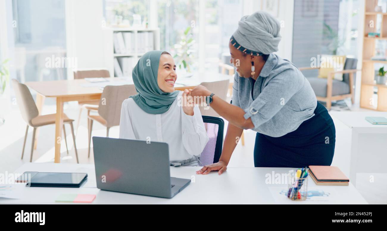 Muslim, women team and laptop with support, advice or conversation for ...