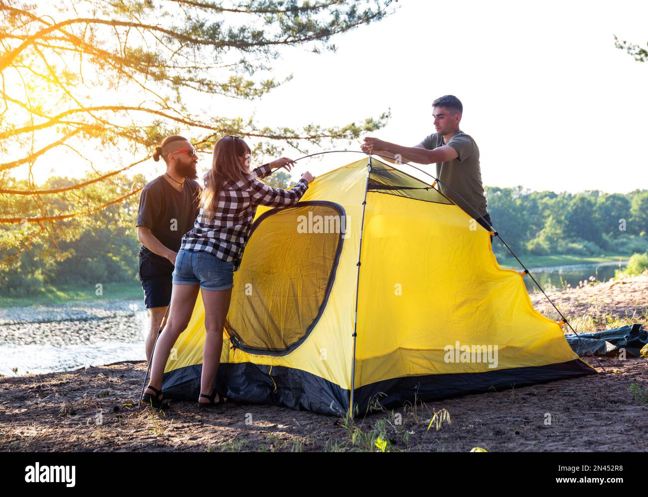 Girls setting up tent hi-res stock photography and images - Alamy