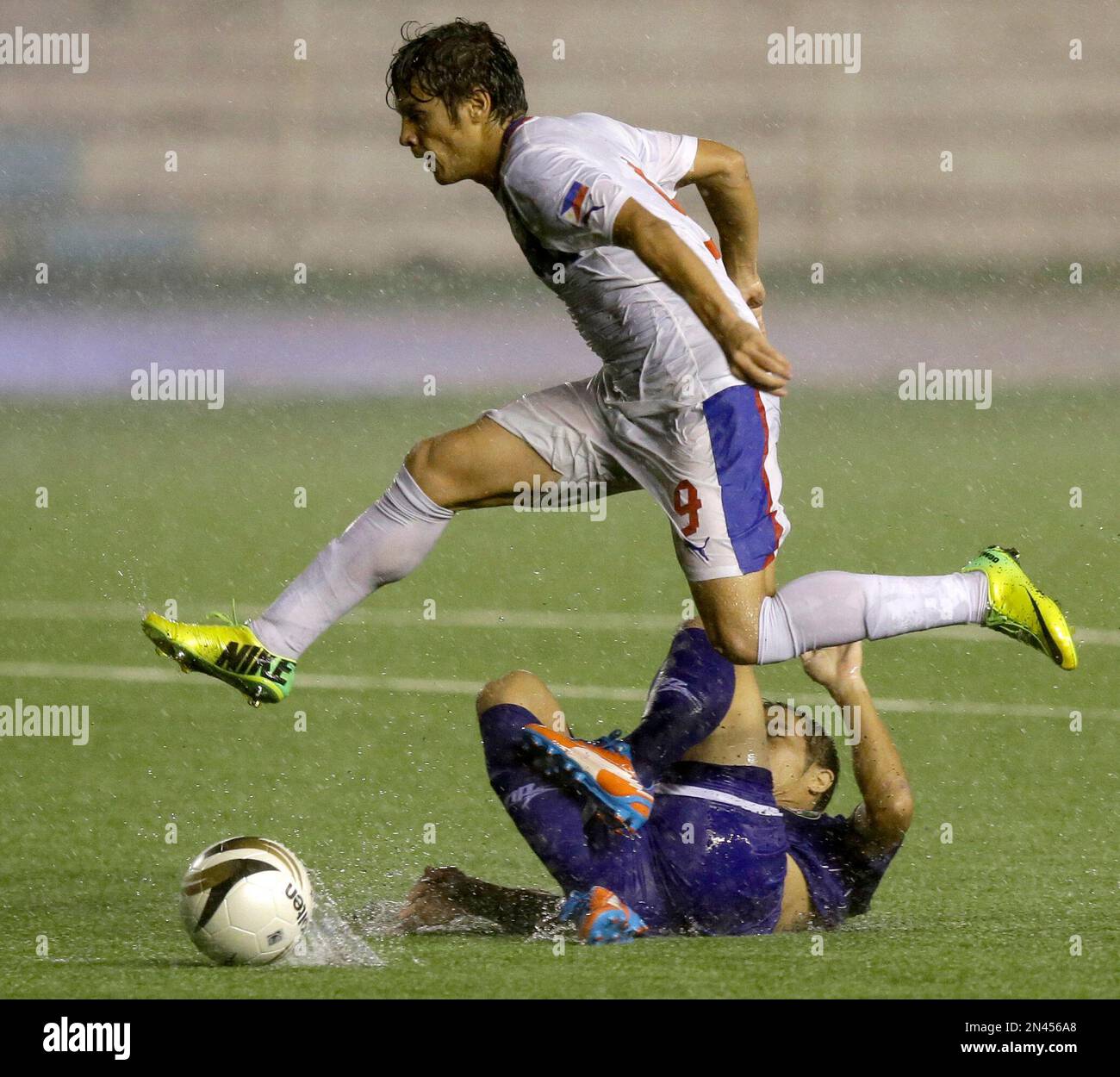 The Philippines' Misagh Bahadoran (9) attempts to break away from the ...