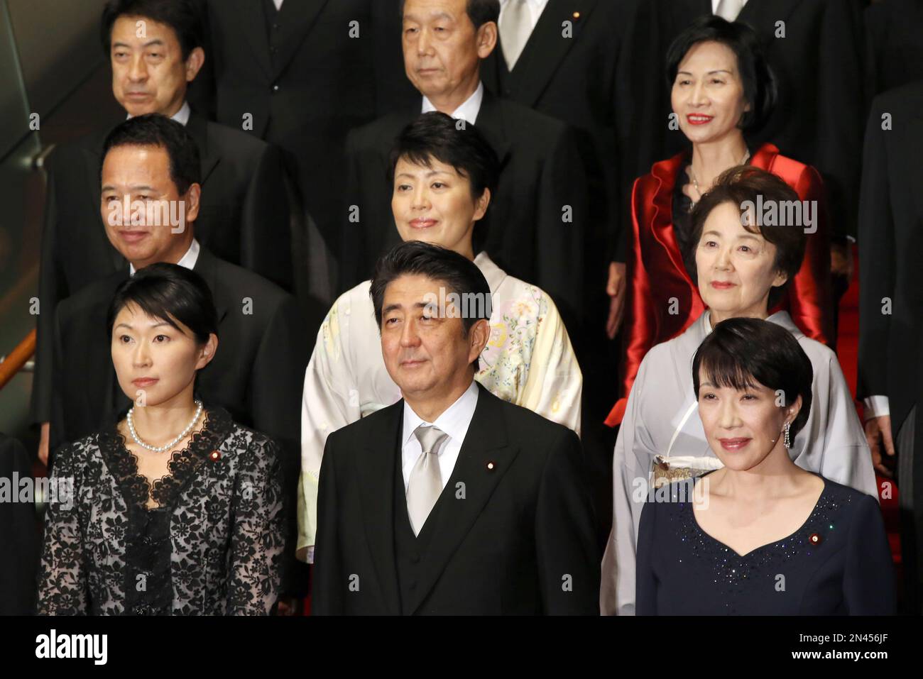 Japanese Prime Minister Shinzo Abe, center bottom, and his new Cabinet ...