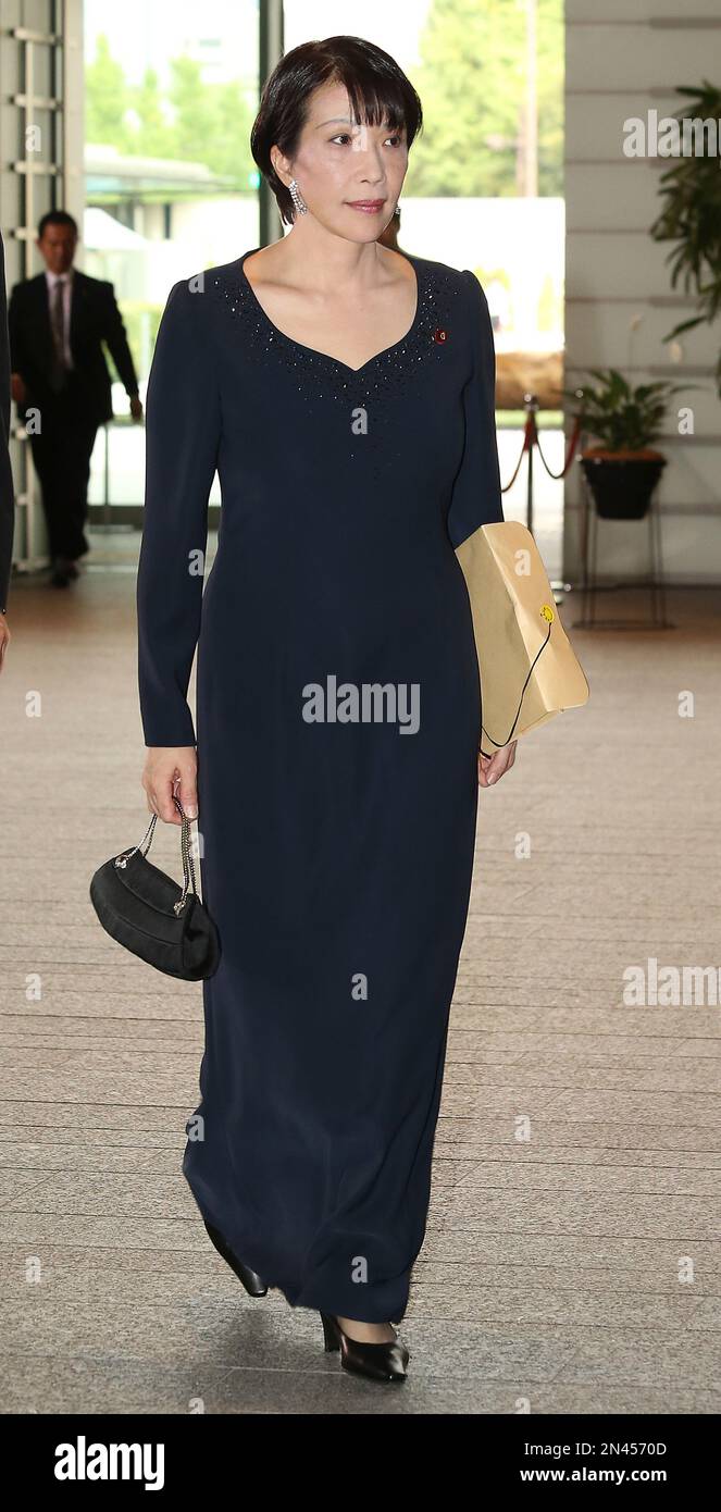 Sanae Takaichi, newly appointed minister of internal affairs, walks ...