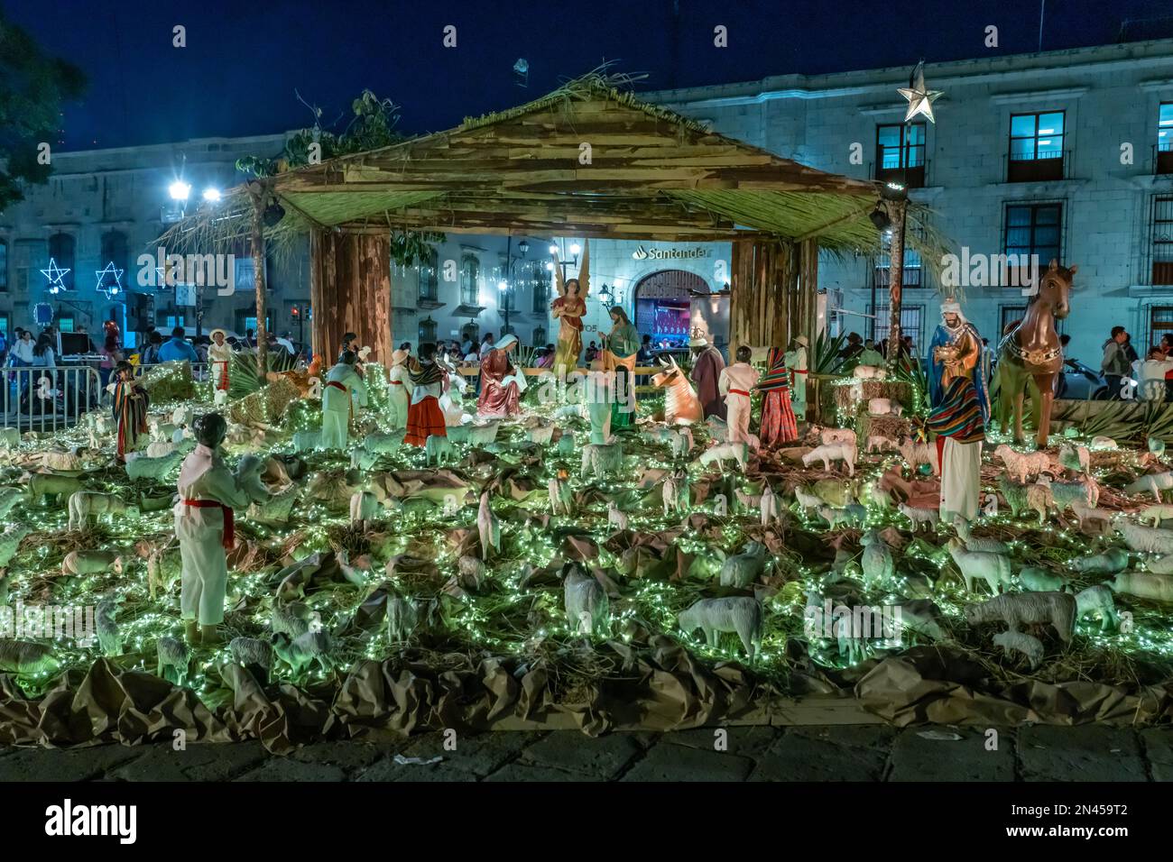 A Christmas Nativity display lit up at night in the Zocalo square in ...