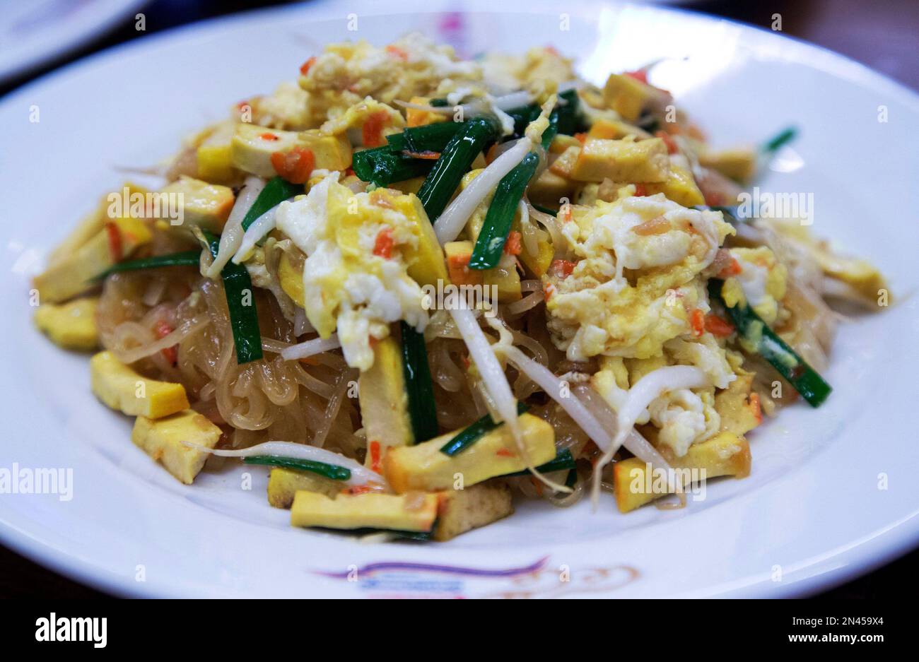 This Wednesday, Aug. 13, 2014 photo showsvPad Thai, cooking at Thip ...