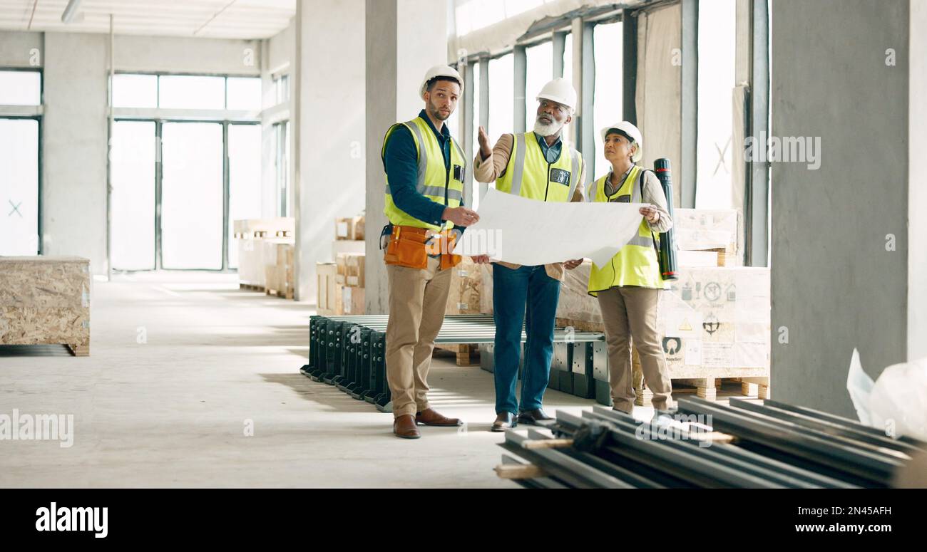 Architect, construction and team planning with blueprint for building ...