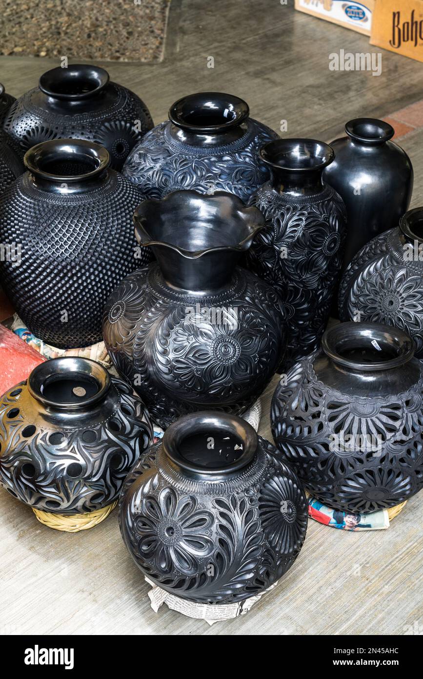 Oaxacan black pottery with cut-out designs for sale in a souvenir shop ...