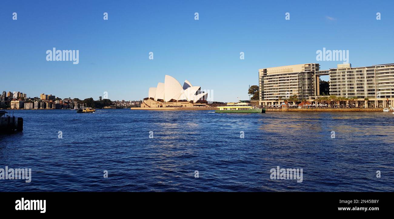 Landscape of the Sydney Opera House surrounded by the water in ...