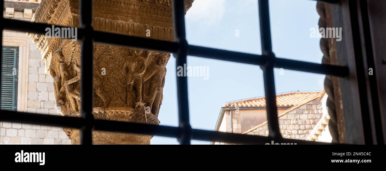 The column details of Rector's Palace through the window grille ...