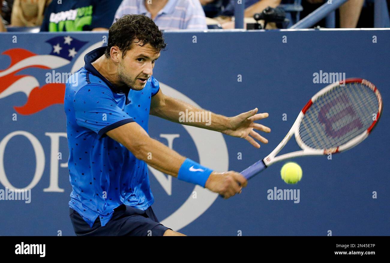 Grigor Dimitrov, of Bulgaria, returns a shot to David Goffin, of ...