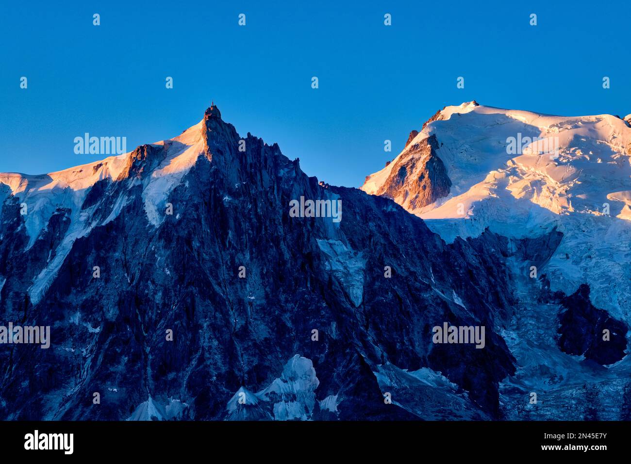 The summits of Aiguille du Midi and Mont Blanc du Tacul, from left, seen from Le Brevent at ...