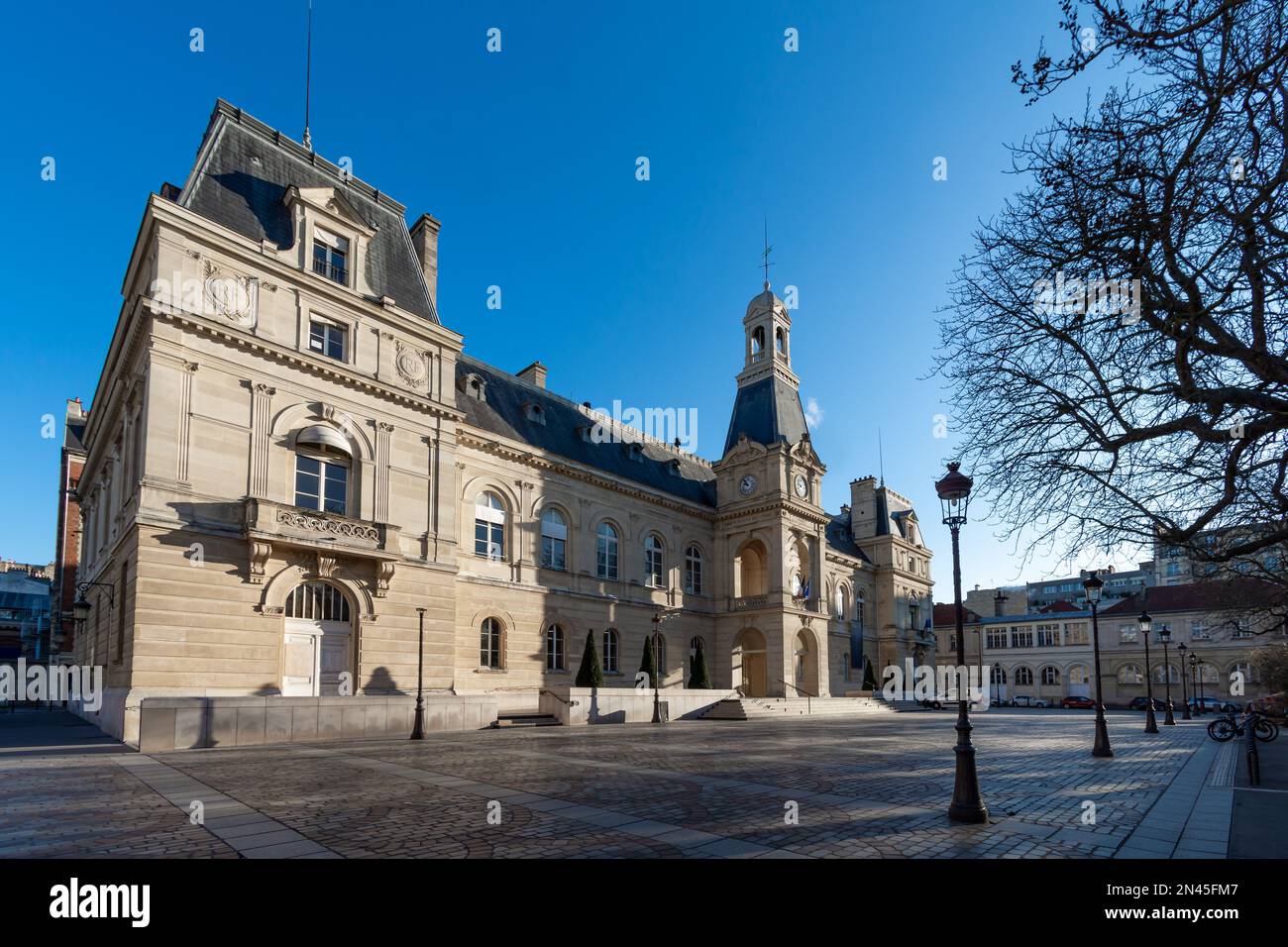 Exterior view of the facade of the town hall building of the 14th ...
