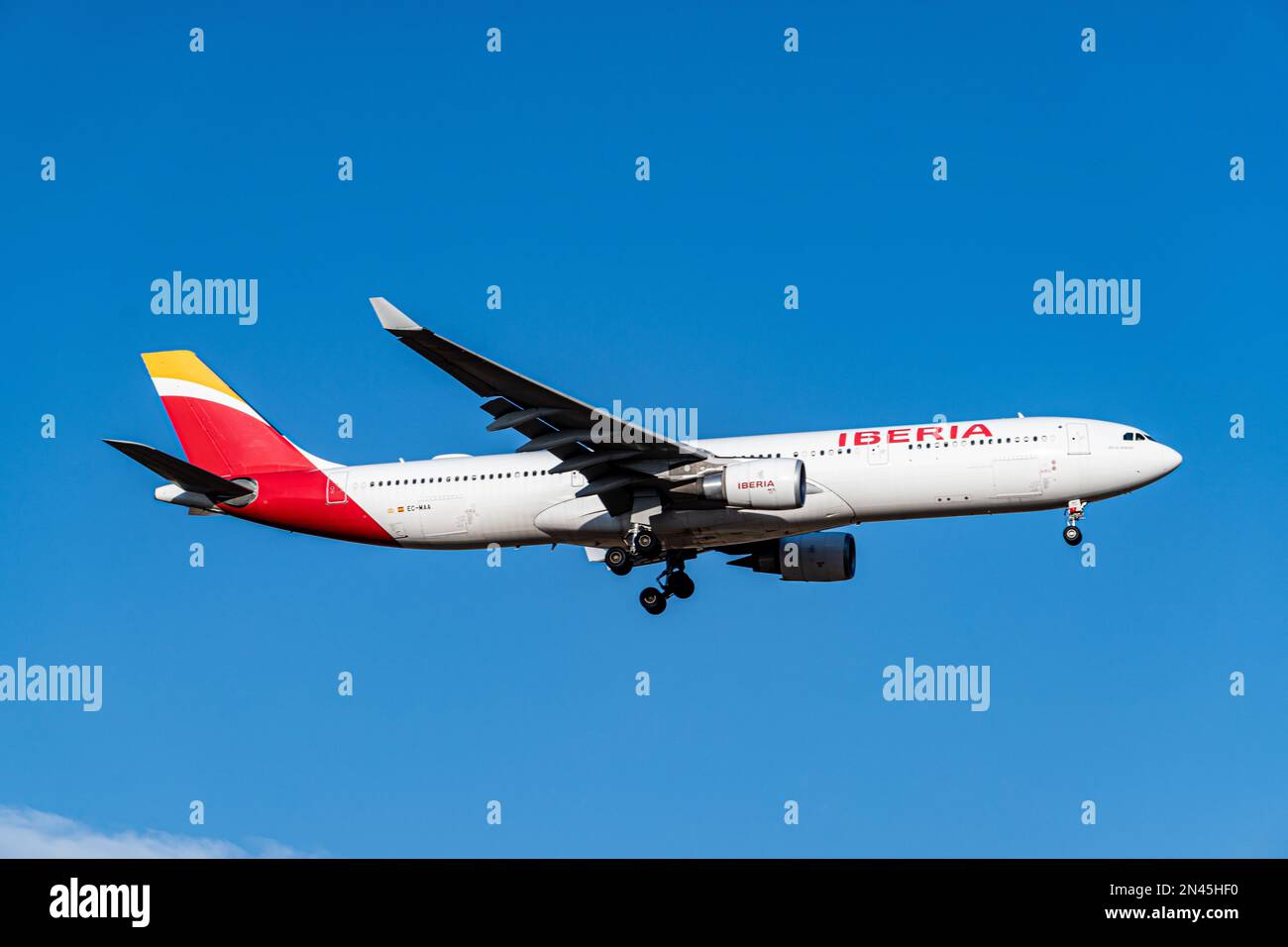 White, red and yellow Iberia airbus a330-302 A333 with registration number EC-MAA and the ...