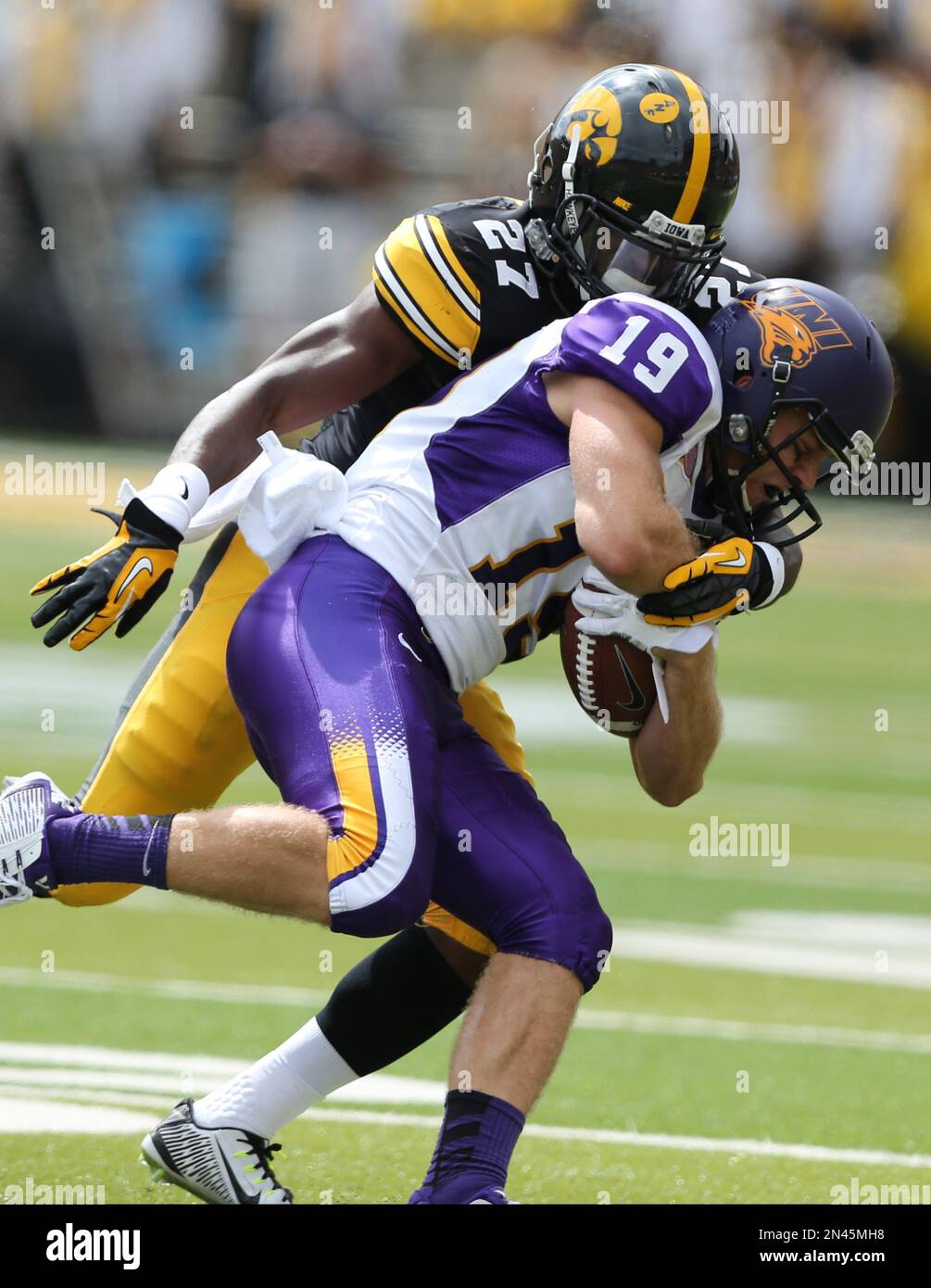 Iowa defensive back Jordan Lomax tackles Northern Iowa wide receiver ...