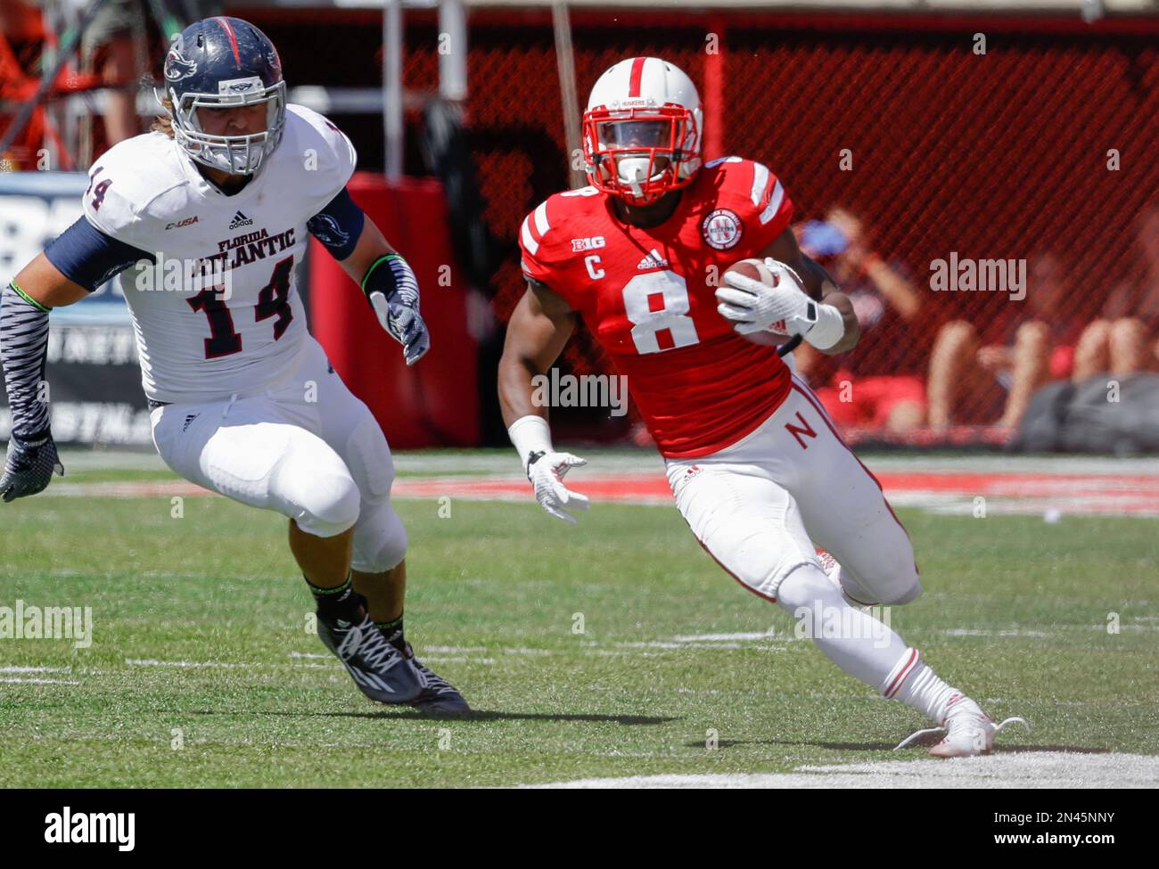 Nebraska running back Ameer Abdullah (8) runs away from Florida ...