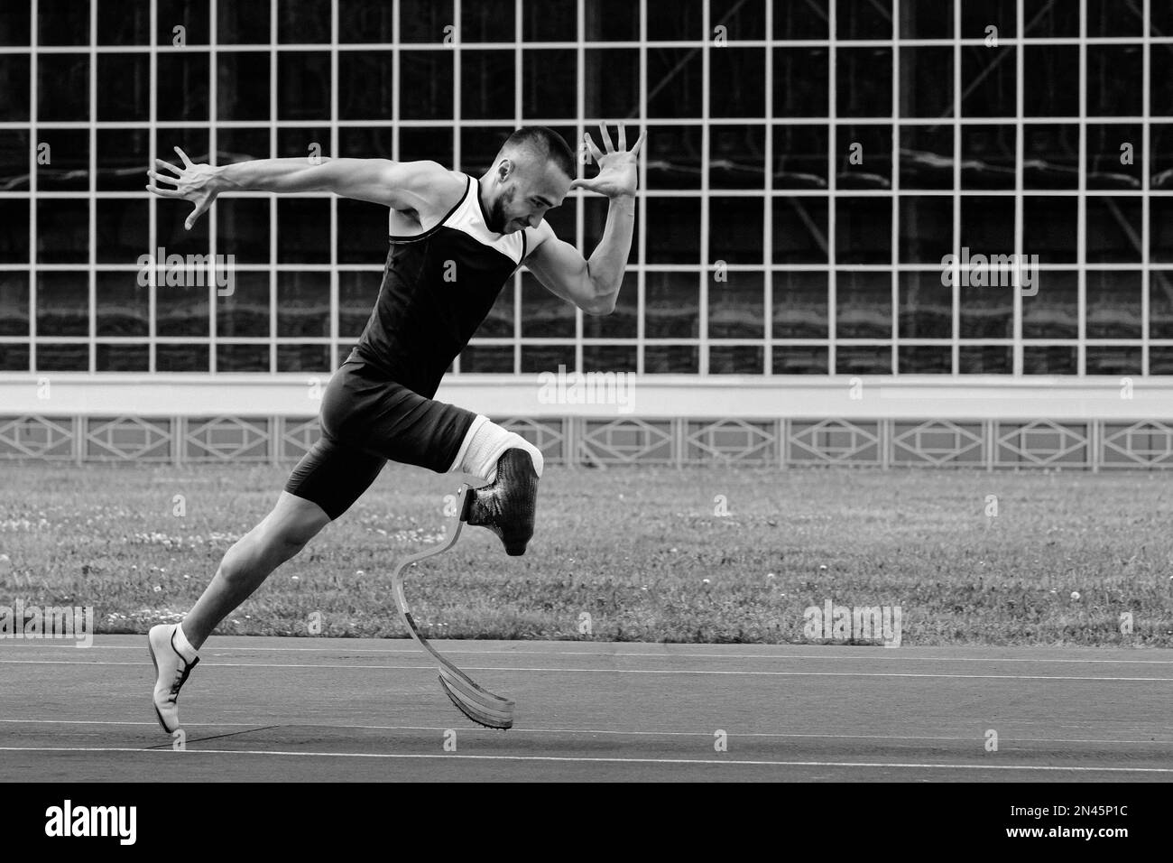 athlete runner disabled run on track black and white photo Stock Photo ...