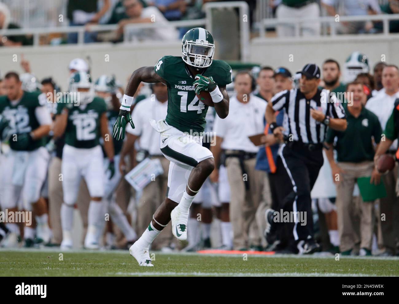 Michigan State wide receiver Tony Lippett scores on a 64-yard touchdown ...