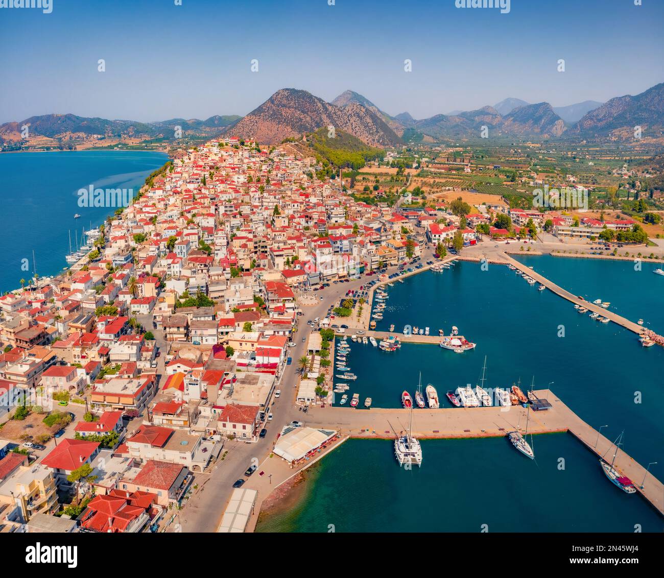 Magnificent summer cityscape of Ermioni port. Wonderful morning ...