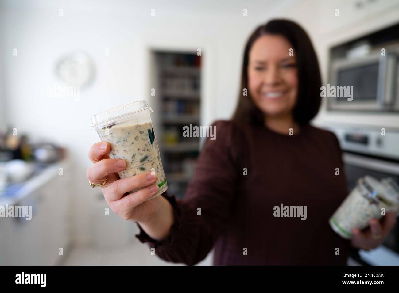 Person getting food out fridge hi-res stock photography and images - Alamy