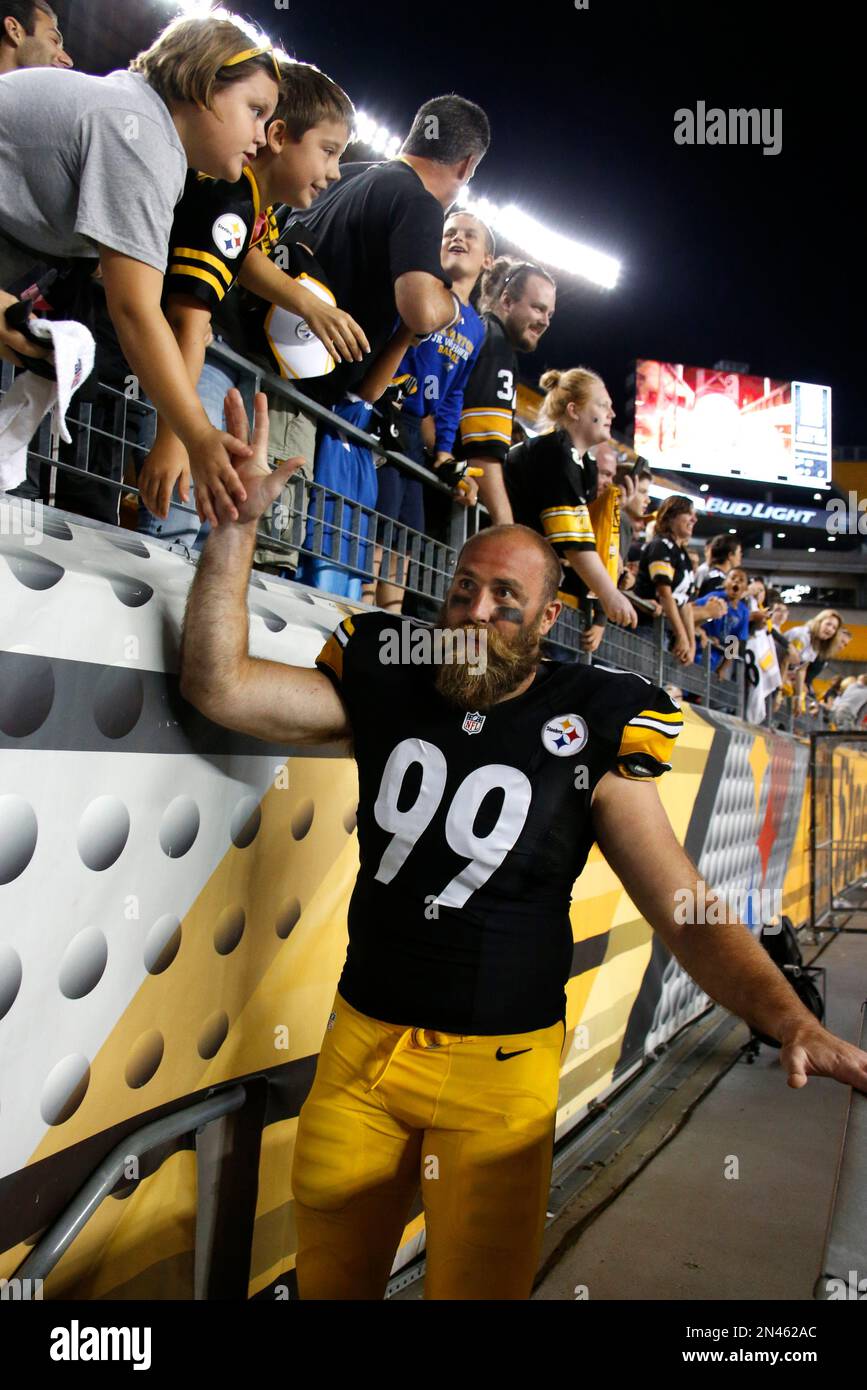 Pittsburgh Steelers' Brett Keisel (99) heads to the locker room after ...