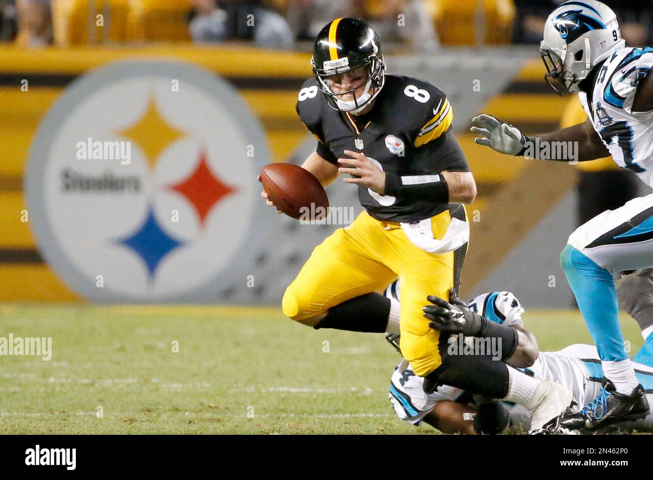 Pittsburgh Steelers quarterback Brendon Kay (8) is hit by Carolina ...