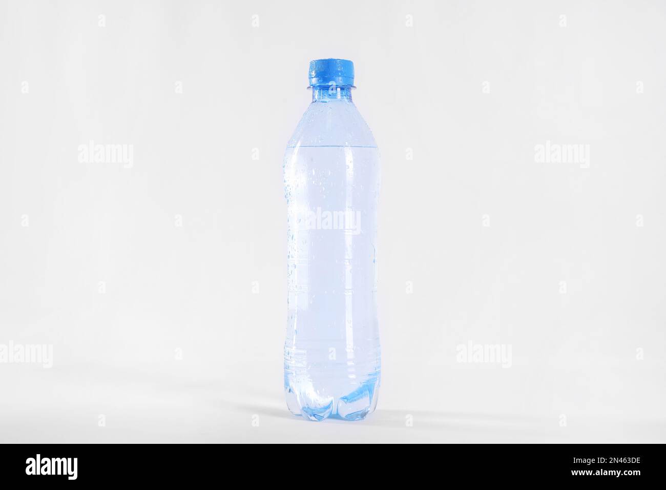 Plastic bottle with pure water isolated on white Stock Photo - Alamy