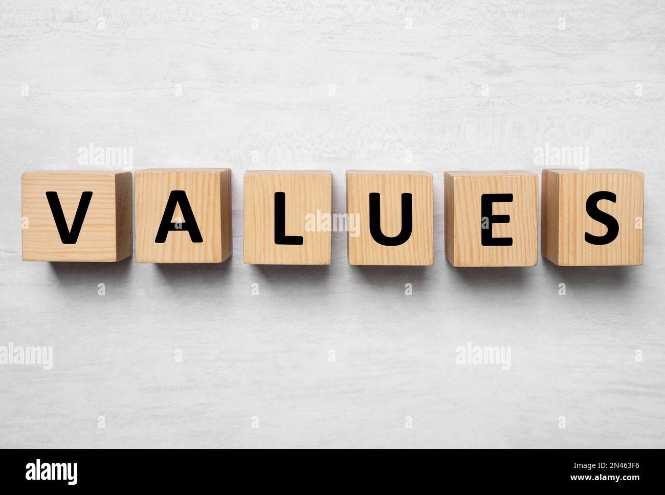 Wooden cubes with word VALUES on white background, flat lay Stock Photo ...