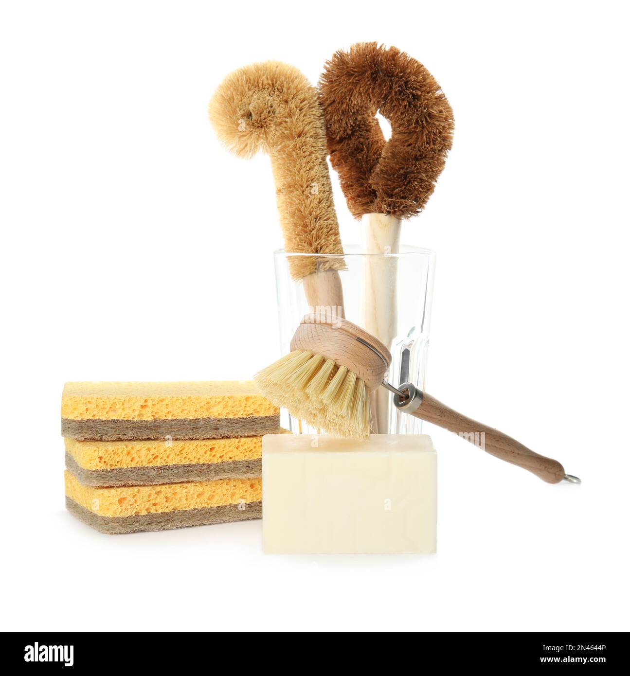 Cleaning supplies for dish washing on white background Stock Photo - Alamy