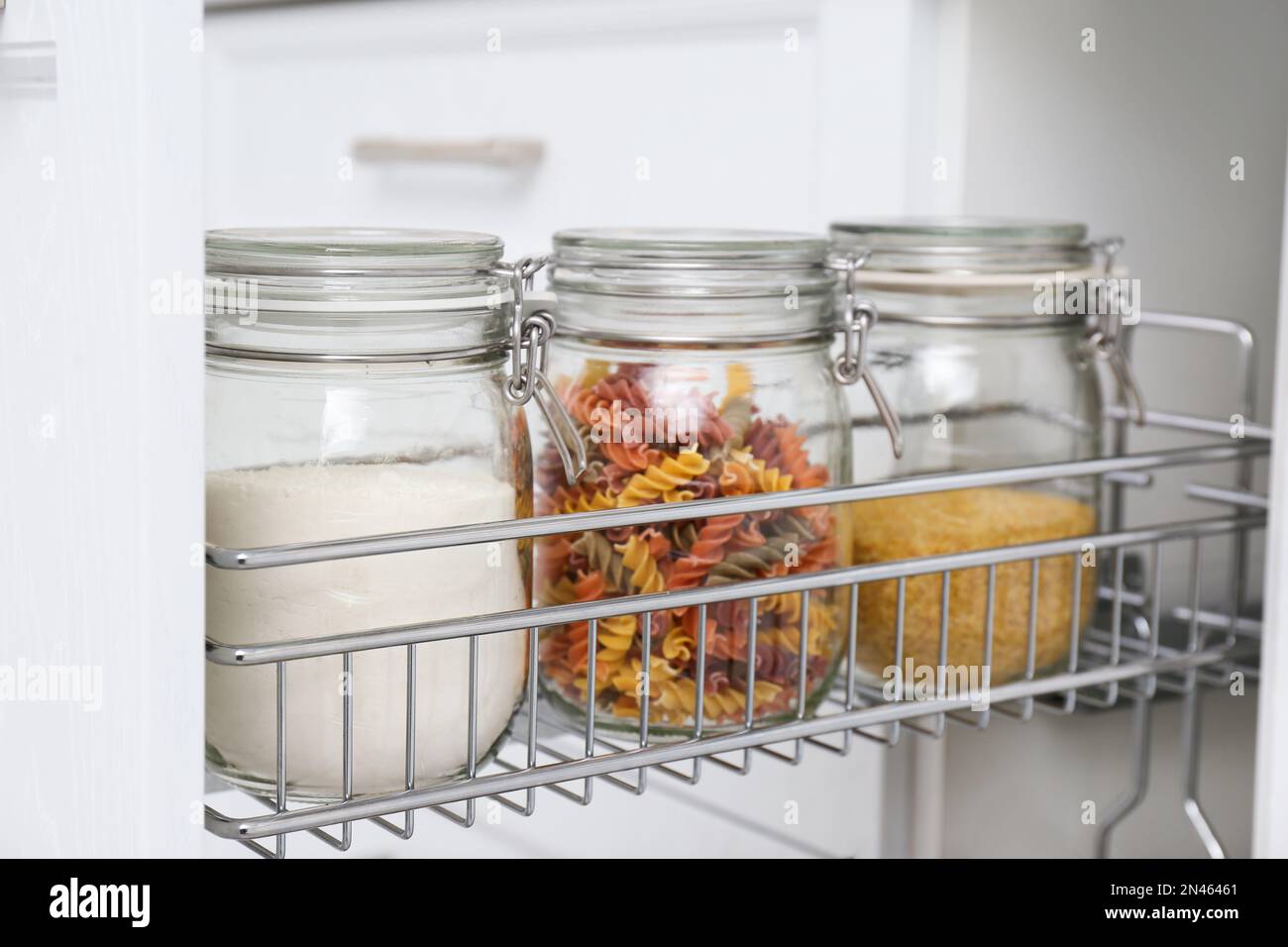 Open drawer with jars of food in kitchen, closeup Stock Photo - Alamy