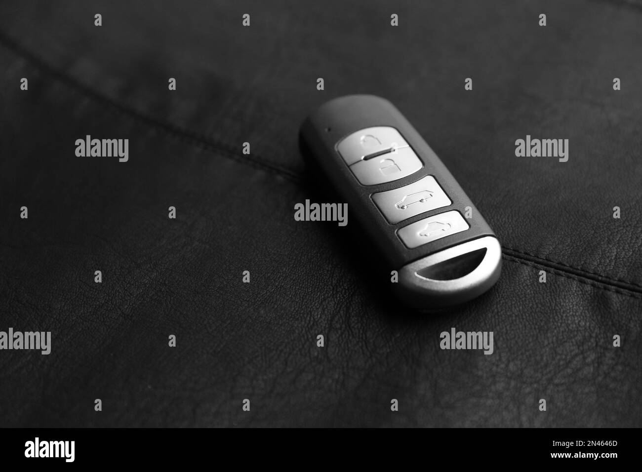 Modern car smart key on leather background. Space for text Stock Photo ...