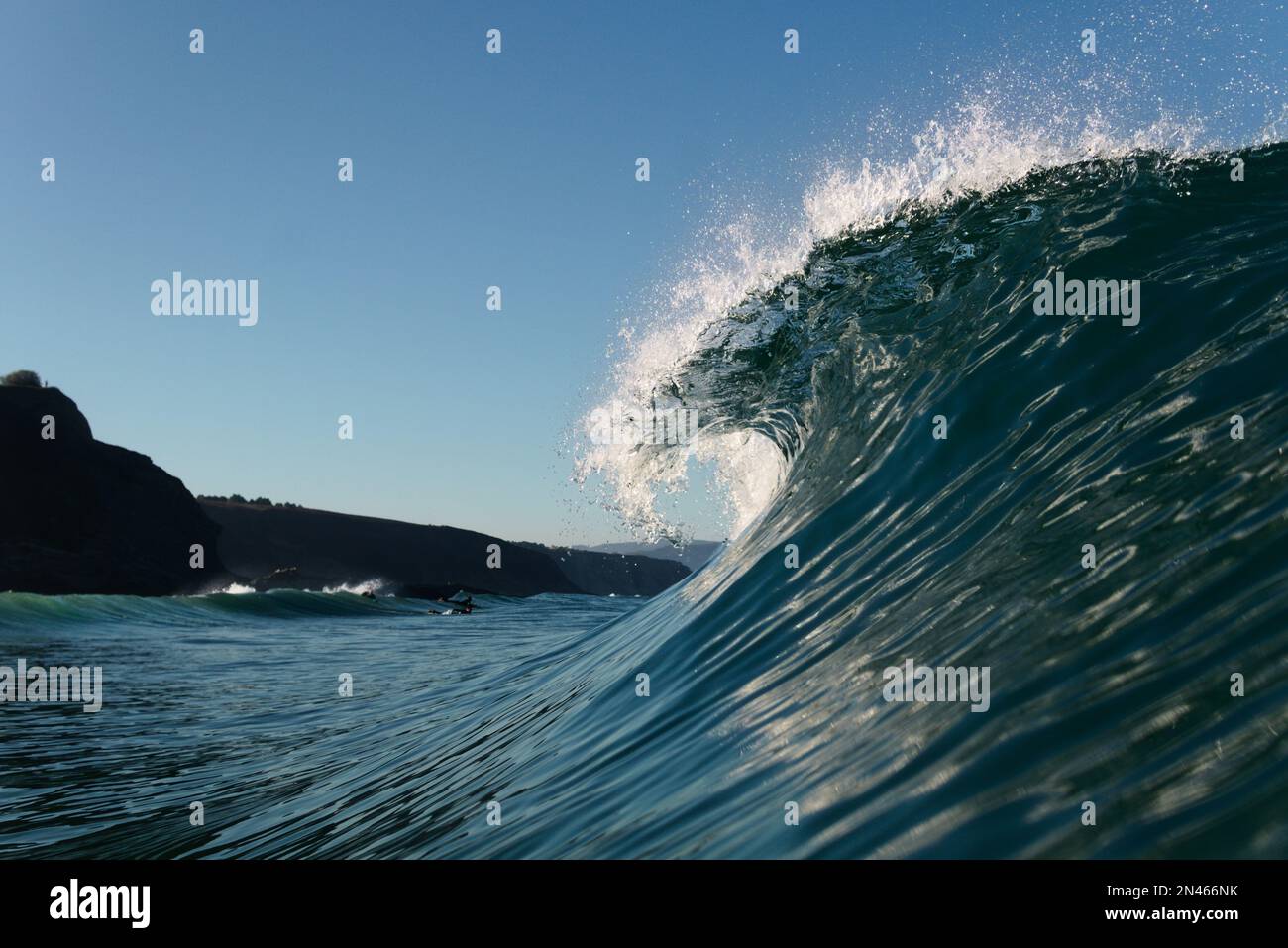 A huge sea wave breaking beach Stock Photo - Alamy