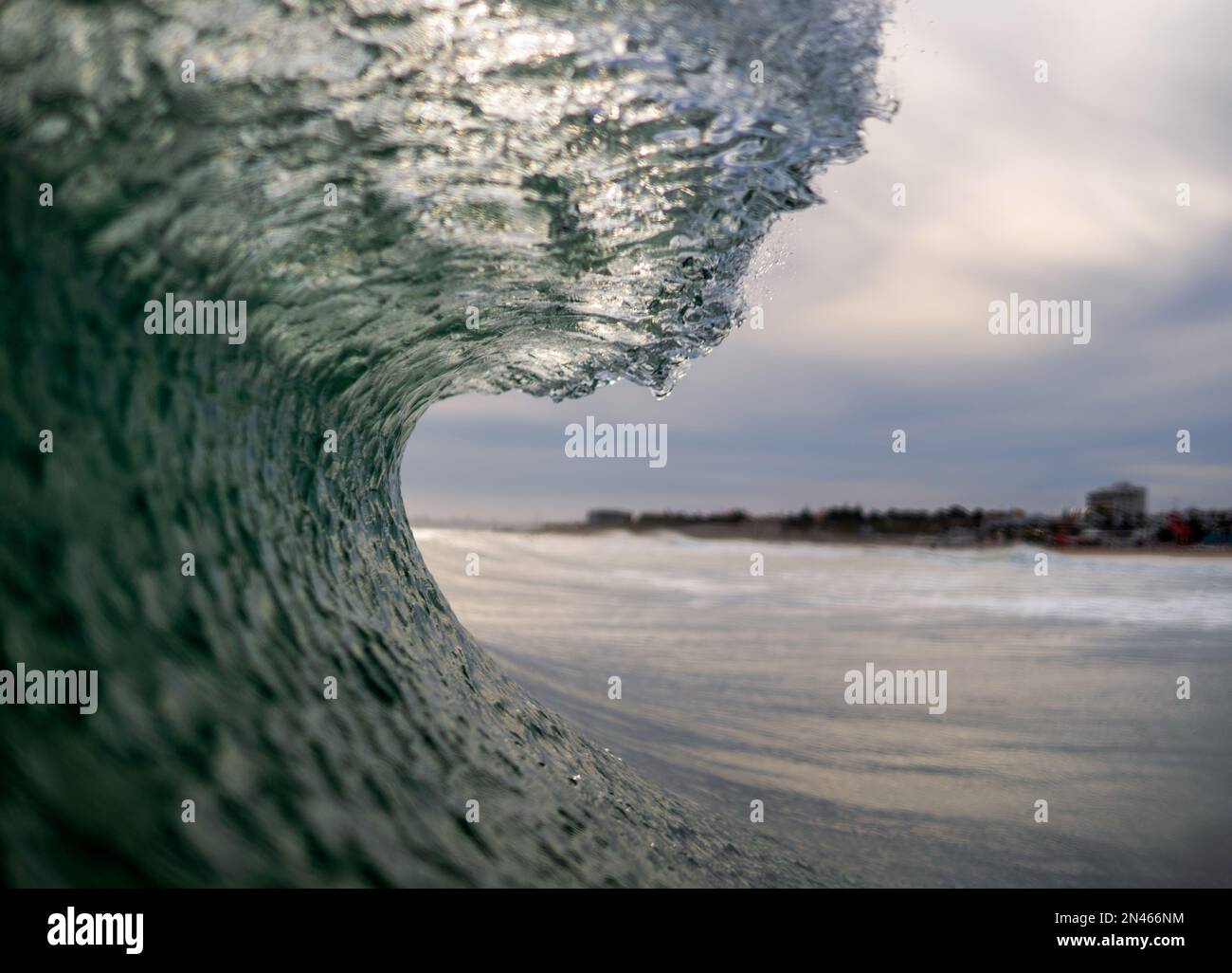 A huge sea wave breaking beach Stock Photo - Alamy