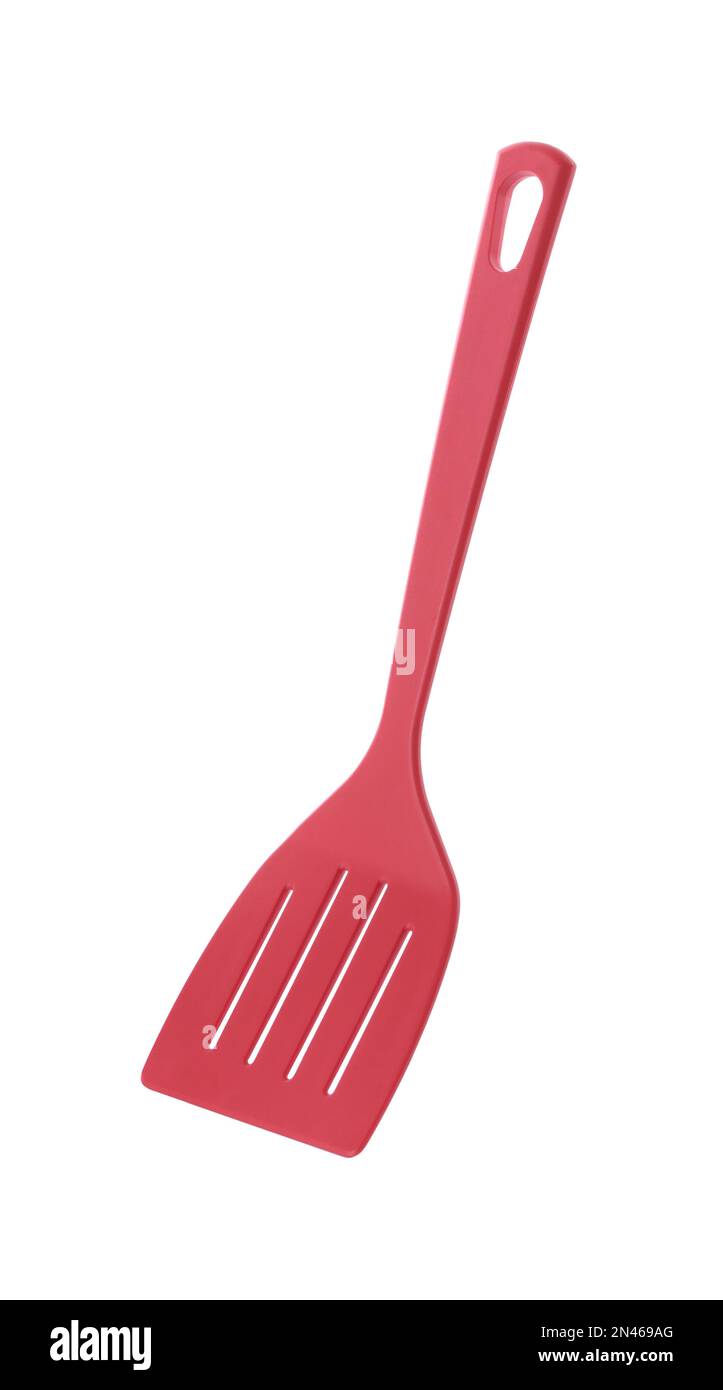 Slotted turner on white background. Kitchen utensils Stock Photo - Alamy