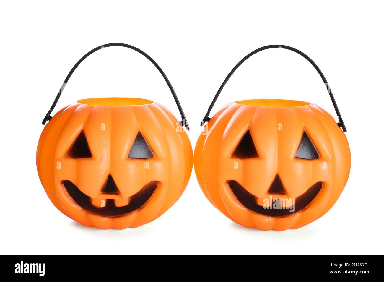 Halloween trick or treat buckets isolated on white Stock Photo - Alamy