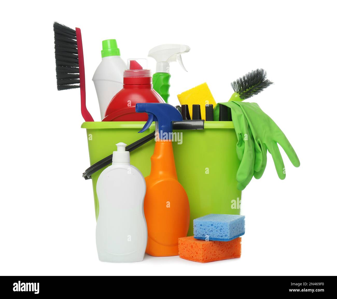 Bucket with different cleaning products and tools on white background ...